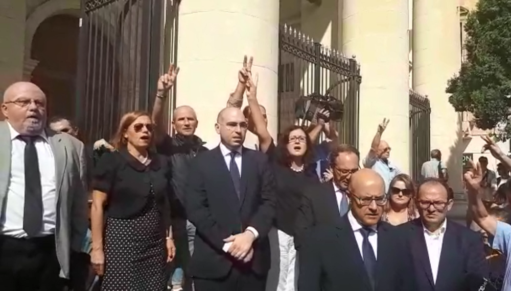 WATCH: Crowd sings Maltese anthem in front of Court, demanding justice ...
