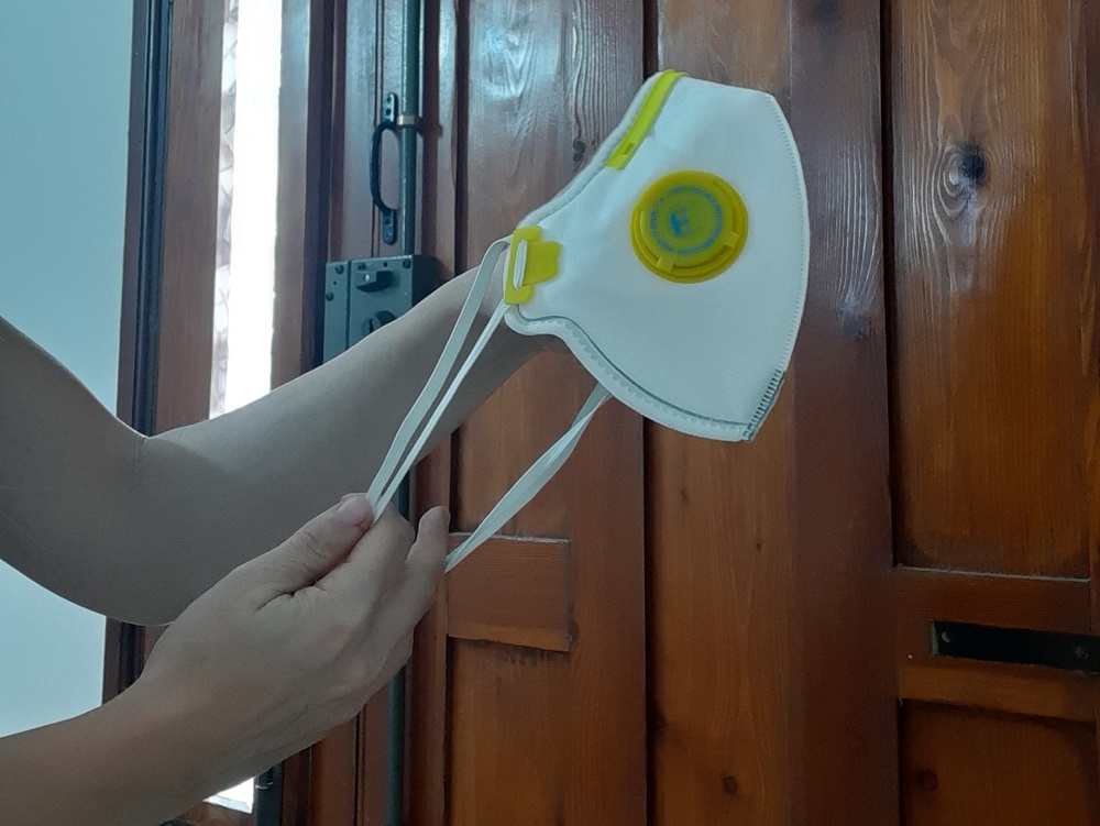 Scientists working on mask which lights up when wearer is infected with ...